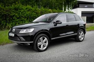 Black Volkswagen Touareg 2016 in Tallinn, with an engine capacity of 3.00 L and mileage of 270 thousand km for 15900 €, photo 1 on AUTOMOTO.COM.LV