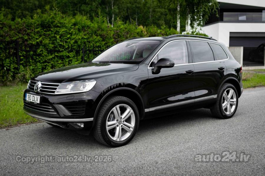 Black Volkswagen Touareg 2016 in Tallinn, with an engine capacity of 3.00 L and mileage of 270 thousand km for 15900 €, photo 1 on AUTOMOTO.COM.LV