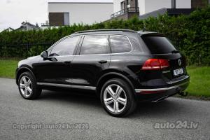 Black Volkswagen Touareg 2016 in Tallinn, with an engine capacity of 3.00 L and mileage of 270 thousand km for 15900 €, photo 4 on AUTOMOTO.COM.LV