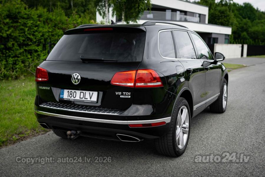 Black Volkswagen Touareg 2016 in Tallinn, with an engine capacity of 3.00 L and mileage of 270 thousand km for 15900 €, photo 5 on AUTOMOTO.COM.LV