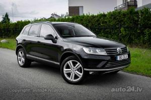 Black Volkswagen Touareg 2016 in Tallinn, with an engine capacity of 3.00 L and mileage of 270 thousand km for 15900 €, photo 6 on AUTOMOTO.COM.LV