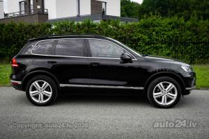 Black Volkswagen Touareg 2016 in Tallinn, with an engine capacity of 3.00 L and mileage of 270 thousand km for 15900 €, photo 7 on AUTOMOTO.COM.LV