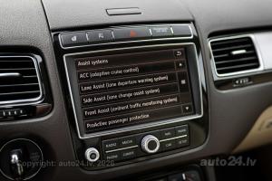 Black Volkswagen Touareg 2016 in Tallinn, with an engine capacity of 3.00 L and mileage of 270 thousand km for 15900 €, photo 15 on AUTOMOTO.COM.LV
