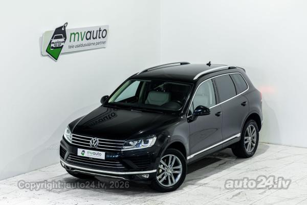 Black Volkswagen Touareg 2016 in Tallinn, with an engine capacity of 3.00 L and mileage of 187 thousand km for 15990 €, photo 1 on AUTOMOTO.COM.LV