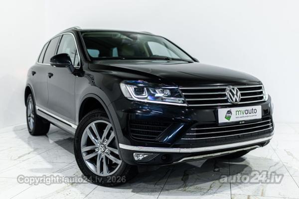 Black Volkswagen Touareg 2016 in Tallinn, with an engine capacity of 3.00 L and mileage of 187 thousand km for 15990 €, photo 5 on AUTOMOTO.COM.LV