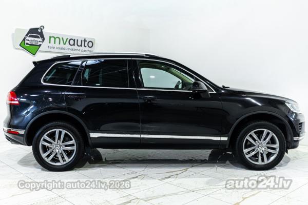 Black Volkswagen Touareg 2016 in Tallinn, with an engine capacity of 3.00 L and mileage of 187 thousand km for 15990 €, photo 10 on AUTOMOTO.COM.LV