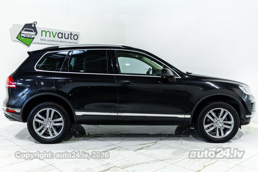 Black Volkswagen Touareg 2016 in Tallinn, with an engine capacity of 3.00 L and mileage of 187 thousand km for 15990 €, photo 11 on AUTOMOTO.COM.LV