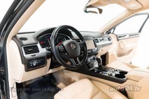 Black Volkswagen Touareg 2016 in Tallinn, with an engine capacity of 3.00 L and mileage of 187 thousand km for 15990 €, photo 12 on AUTOMOTO.COM.LV