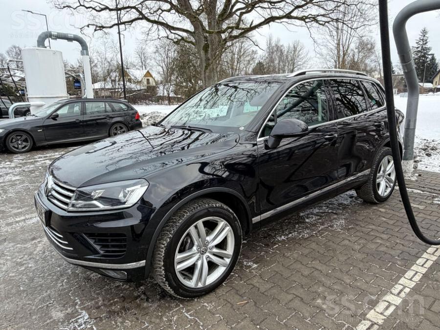 Black Volkswagen Touareg 2017 in Riga, with an engine capacity of 3.00 L and mileage of 180 thousand km for 23000 €, photo 1 on AUTOMOTO.COM.LV