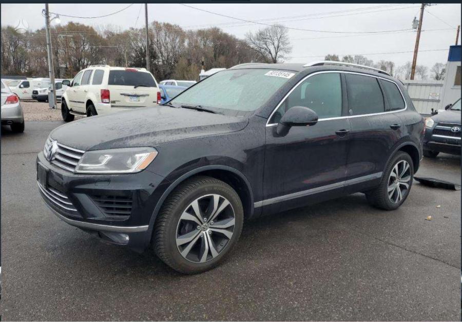Black Volkswagen Touareg 2017 in Vilnius, with an engine capacity of 3.00 L and mileage of 121 thousand km for 14500 €, photo 1 on AUTOMOTO.COM.LV
