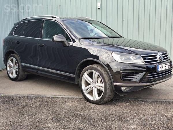 Black Volkswagen Touareg 2017 in Ogre, with an engine capacity of 3.00 L and mileage of 310 thousand km for 16700 €, photo 1 on AUTOMOTO.COM.LV