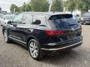 Black Volkswagen Touareg 2018 in Kaunas, with an engine capacity of 3.00 L and mileage of 173 thousand km for 30950 €, photo 5 on AUTOMOTO.COM.LV