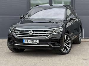 Black Volkswagen Touareg 2019 in Jonava, with an engine capacity of 2.97 L and mileage of 260 thousand km for 31900 €, photo 1 on AUTOMOTO.COM.LV