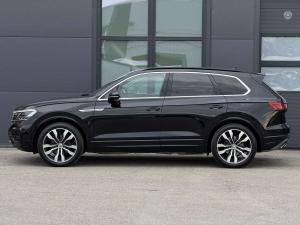 Black Volkswagen Touareg 2019 in Jonava, with an engine capacity of 2.97 L and mileage of 260 thousand km for 31900 €, photo 5 on AUTOMOTO.COM.LV