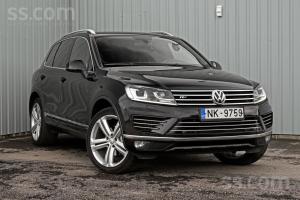 Black Volkswagen Touareg 2024 in Ogre, with an engine capacity of 3.00 L and mileage of 310 thousand km for 14900 €, photo 3 on AUTOMOTO.COM.LV
