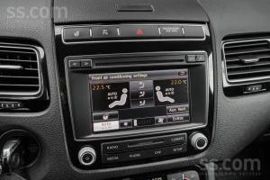 Black Volkswagen Touareg 2024 in Ogre, with an engine capacity of 3.00 L and mileage of 310 thousand km for 14900 €, photo 13 on AUTOMOTO.COM.LV