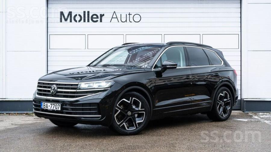 Black Volkswagen Touareg 2025 in Riga, with an engine capacity of 3.00 L and mileage of 15 thousand km for 63950 €, photo 1 on AUTOMOTO.COM.LV
