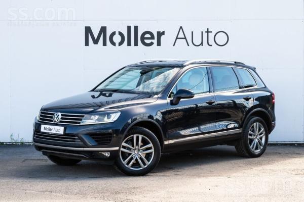 Black Volkswagen Touareg 2015 in Riga, with an engine capacity of 3.00 L and mileage of 275 thousand km for 15550 €, photo 1 on AUTOMOTO.COM.LV