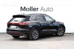 Black Volkswagen Touareg 2025 in Riga, with an engine capacity of 3.00 L and mileage of 14 thousand km for 58900 €, photo 4 on AUTOMOTO.COM.LV