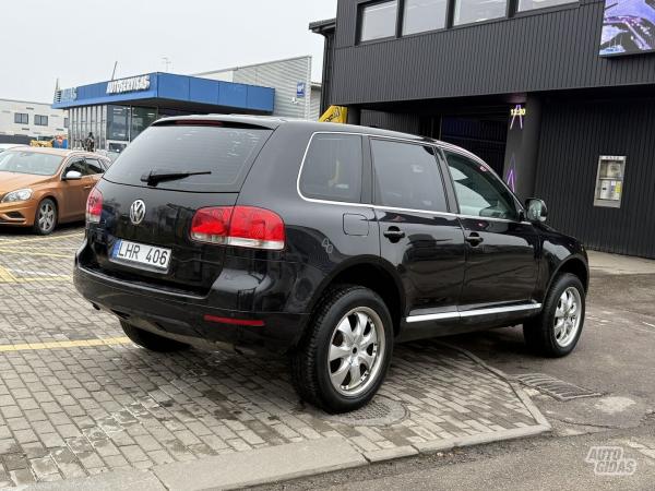 Black Volkswagen Touareg 2004 in Siauliai, with an engine capacity of 2.50 L and mileage of 360 thousand km for 1750 €, photo 5 on AUTOMOTO.COM.LV