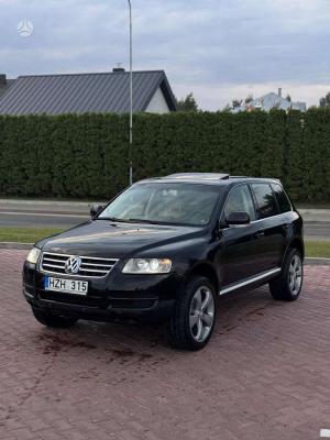 Black Volkswagen Touareg 2005 in Vilnius, with an engine capacity of 2.46 L and mileage of 342 thousand km for 1950 €, photo  on AUTOMOTO.COM.LV