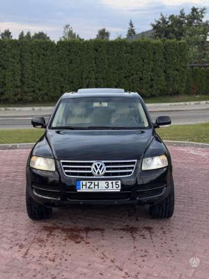 Black Volkswagen Touareg 2005 in Vilnius, with an engine capacity of 2.46 L and mileage of 342 thousand km for 1950 €, photo 3 on AUTOMOTO.COM.LV