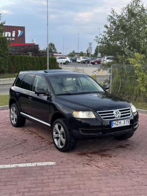 Black Volkswagen Touareg 2005 in Vilnius, with an engine capacity of 2.46 L and mileage of 342 thousand km for 1950 €, photo 4 on AUTOMOTO.COM.LV