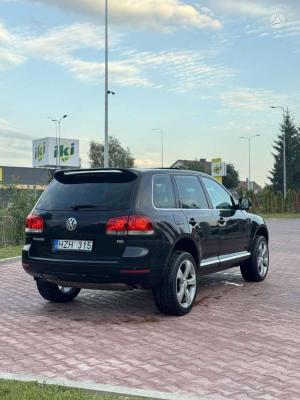 Black Volkswagen Touareg 2005 in Vilnius, with an engine capacity of 2.46 L and mileage of 342 thousand km for 1950 €, photo 5 on AUTOMOTO.COM.LV