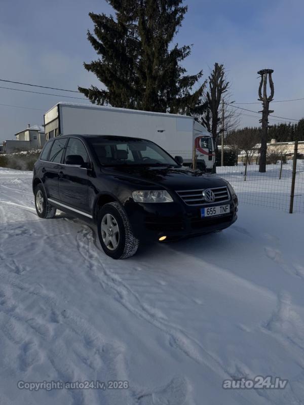 Melns Volkswagen Touareg 2003 Narva, ar dzinēja tilpumu 2.50 L un nobraukumu 300 tūkst. km par 3300 €, foto 1 vietnē AUTOMOTO.COM.LV
