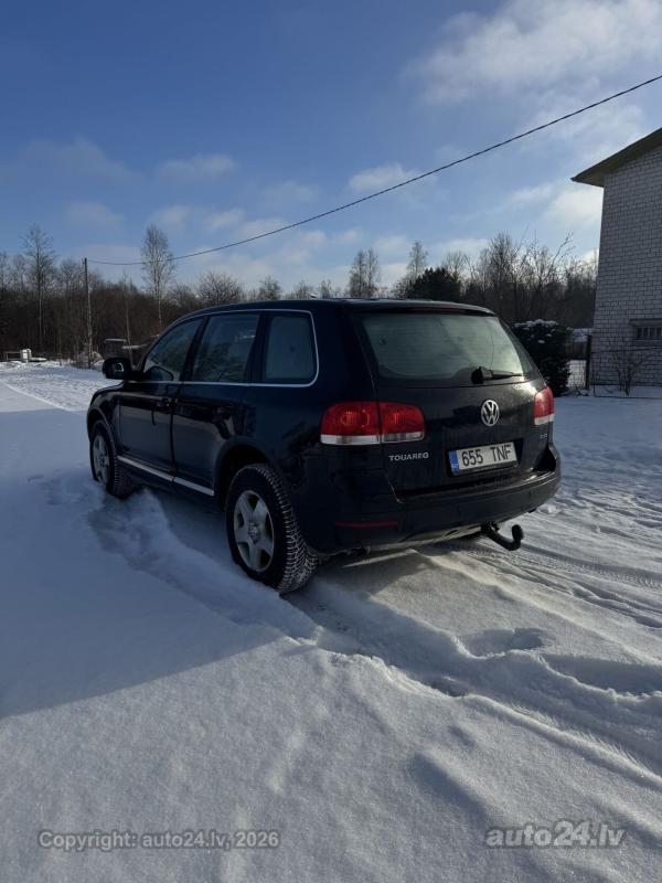Melns Volkswagen Touareg 2003 Narva, ar dzinēja tilpumu 2.50 L un nobraukumu 300 tūkst. km par 3300 €, foto 6 vietnē AUTOMOTO.COM.LV