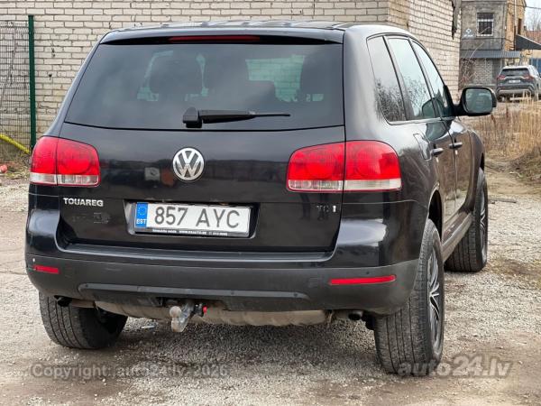 Melns Volkswagen Touareg 2004 Narva, ar dzinēja tilpumu 2.50 L un nobraukumu 358 tūkst. km par 1499 €, foto 4 vietnē AUTOMOTO.COM.LV