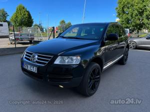 Melns Volkswagen Touareg 2006 Tallina, ar dzinēja tilpumu 3.00 L un nobraukumu 267 tūkst. km par 3900 €, foto  vietnē AUTOMOTO.COM.LV