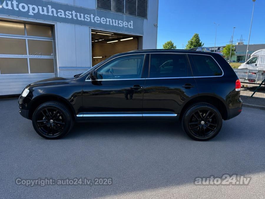 Melns Volkswagen Touareg 2006 Tallina, ar dzinēja tilpumu 3.00 L un nobraukumu 267 tūkst. km par 3900 €, foto 3 vietnē AUTOMOTO.COM.LV