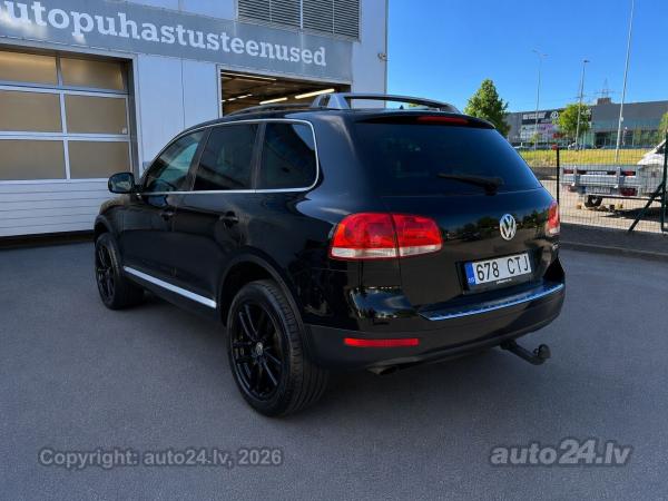 Black Volkswagen Touareg 2006 in Tallinn, with an engine capacity of 3.00 L and mileage of 267 thousand km for 3900 €, photo 3 on AUTOMOTO.COM.LV