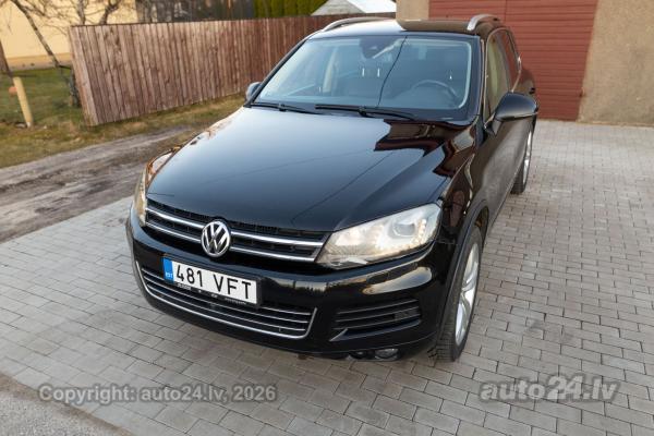 Black Volkswagen Touareg 2010 in Tallinn, with an engine capacity of 3.00 L and mileage of 392 thousand km for 10000 €, photo 2 on AUTOMOTO.COM.LV