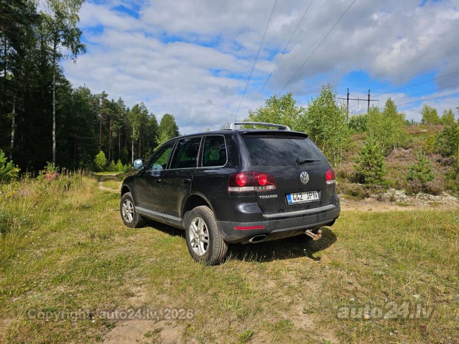 Melns Volkswagen Touareg 2010 Tallina, ar dzinēja tilpumu 2.50 L un nobraukumu 223 tūkst. km par 7500 €, foto 4 vietnē AUTOMOTO.COM.LV