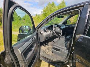 Melns Volkswagen Touareg 2010 Tallina, ar dzinēja tilpumu 2.50 L un nobraukumu 223 tūkst. km par 7500 €, foto 13 vietnē AUTOMOTO.COM.LV