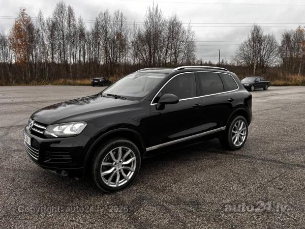 Melns Volkswagen Touareg 2012 Tallina, ar dzinēja tilpumu 4.20 L un nobraukumu 259 tūkst. km par 13200 €, foto 3 vietnē AUTOMOTO.COM.LV