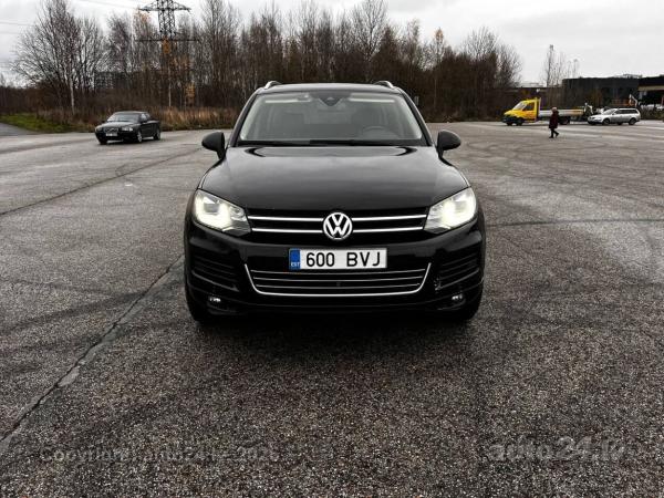 Melns Volkswagen Touareg 2012 Tallina, ar dzinēja tilpumu 4.20 L un nobraukumu 259 tūkst. km par 13200 €, foto 4 vietnē AUTOMOTO.COM.LV