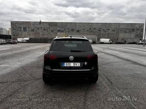 Black Volkswagen Touareg 2012 in Tallinn, with an engine capacity of 4.20 L and mileage of 259 thousand km for 13200 €, photo 6 on AUTOMOTO.COM.LV