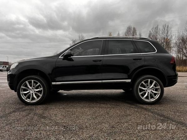 Melns Volkswagen Touareg 2012 Tallina, ar dzinēja tilpumu 4.20 L un nobraukumu 259 tūkst. km par 13200 €, foto 7 vietnē AUTOMOTO.COM.LV