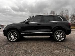 Black Volkswagen Touareg 2012 in Tallinn, with an engine capacity of 4.20 L and mileage of 259 thousand km for 13200 €, photo 7 on AUTOMOTO.COM.LV