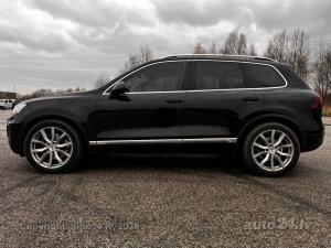 Black Volkswagen Touareg 2012 in Tallinn, with an engine capacity of 4.20 L and mileage of 259 thousand km for 13200 €, photo 8 on AUTOMOTO.COM.LV