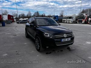 Black Volkswagen Touareg 2012 in Tallinn, with an engine capacity of 4.10 L and mileage of 261 thousand km for 9999 €, photo  on AUTOMOTO.COM.LV