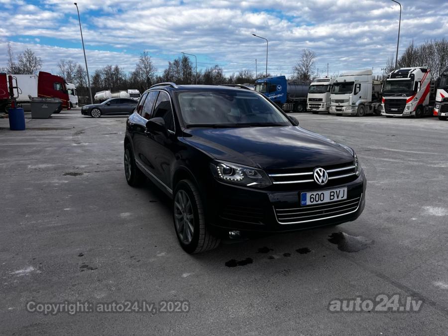 Black Volkswagen Touareg 2012 in Tallinn, with an engine capacity of 4.10 L and mileage of 261 thousand km for 9999 €, photo 1 on AUTOMOTO.COM.LV