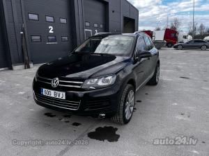 Black Volkswagen Touareg 2012 in Tallinn, with an engine capacity of 4.10 L and mileage of 261 thousand km for 9999 €, photo 3 on AUTOMOTO.COM.LV