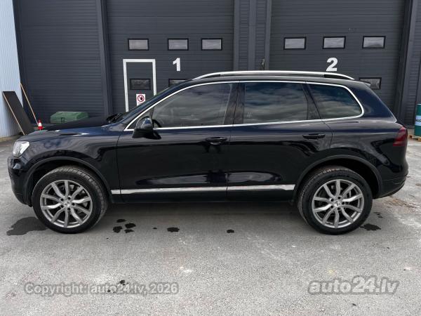 Black Volkswagen Touareg 2012 in Tallinn, with an engine capacity of 4.10 L and mileage of 261 thousand km for 9999 €, photo 5 on AUTOMOTO.COM.LV