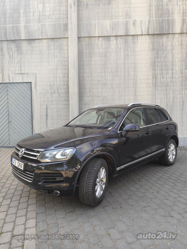 Black Volkswagen Touareg 2013 in Tallinn, with an engine capacity of 3.00 L and mileage of 260 thousand km for 12500 €, photo 2 on AUTOMOTO.COM.LV