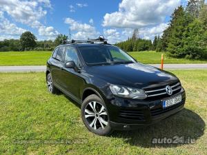 Black Volkswagen Touareg 2014 in Viljandi, with an engine capacity of 3.00 L and mileage of 498 thousand km for 10000 €, photo  on AUTOMOTO.COM.LV