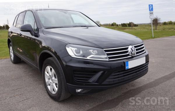 Black Volkswagen Touareg 2015 in Riga, with an engine capacity of 3.00 L and mileage of 244 thousand km for 13900 €, photo 1 on AUTOMOTO.COM.LV